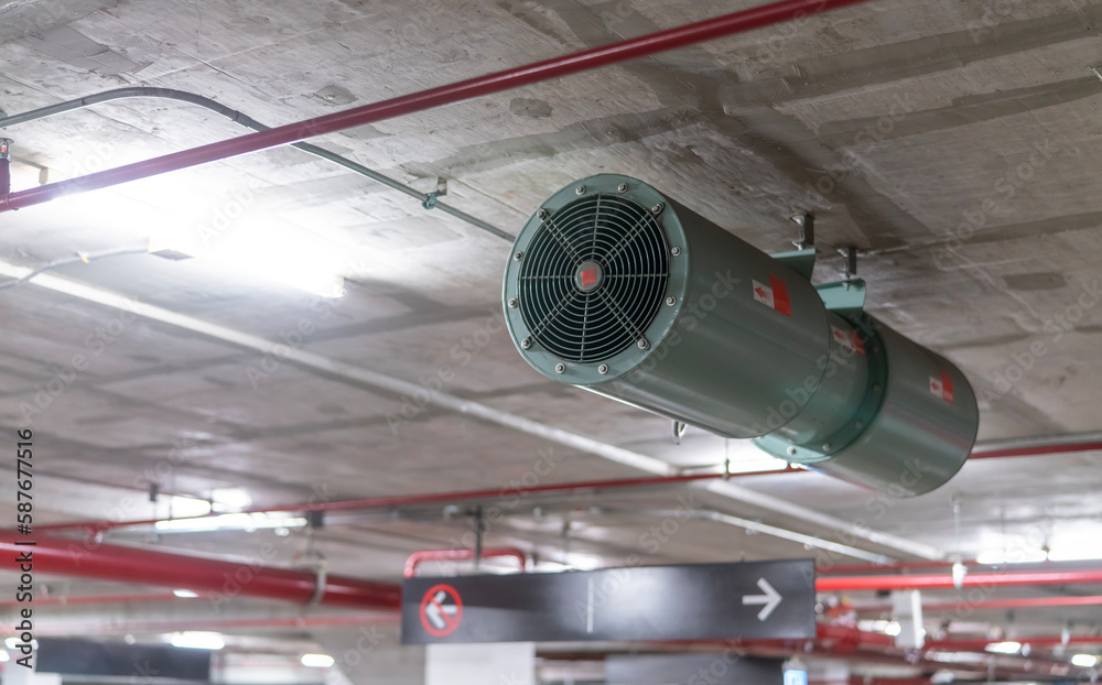 Jet fan at underground parking area. Ventilation fan in the parking lot ...