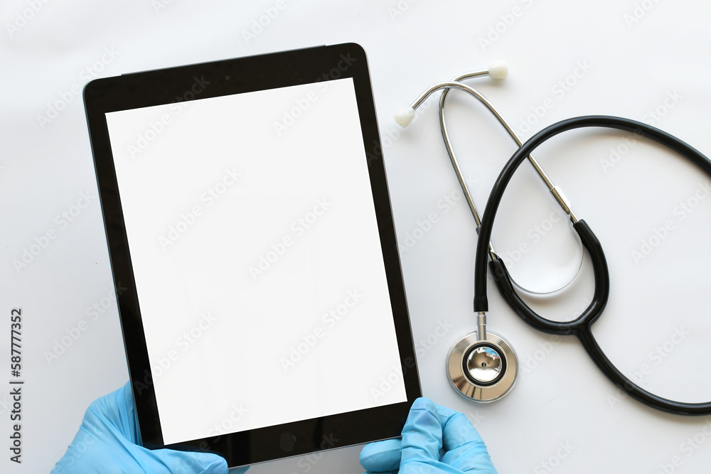 Foto de Medical professional tablet blank white screen for mock up of ...