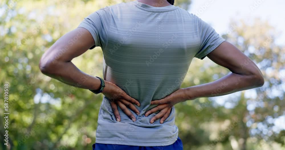 Fitness, man and back pain for runner in park with injury, ache or ...
