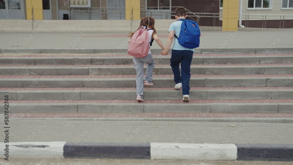 child students cross road zebra crossing. friends classmates pass car ...