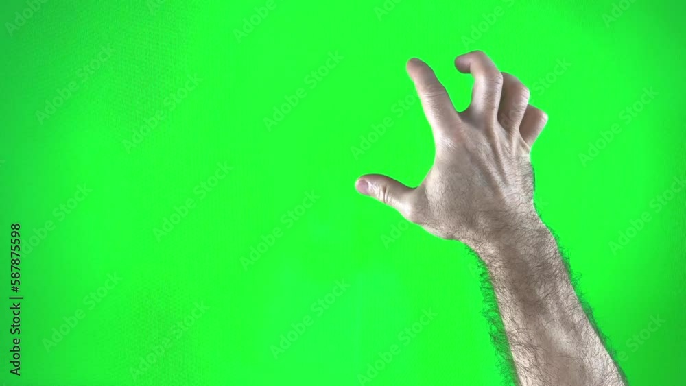 on a green screen chroma key a man opens windows with two fingers ...