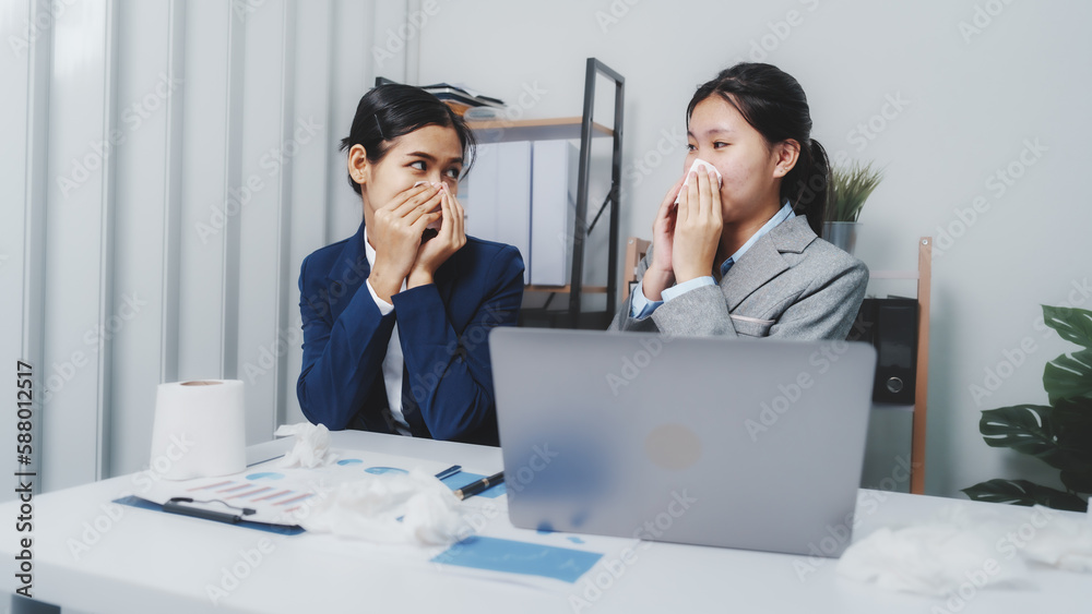 Young pretty asian business woman with friends having covid and sinus ...