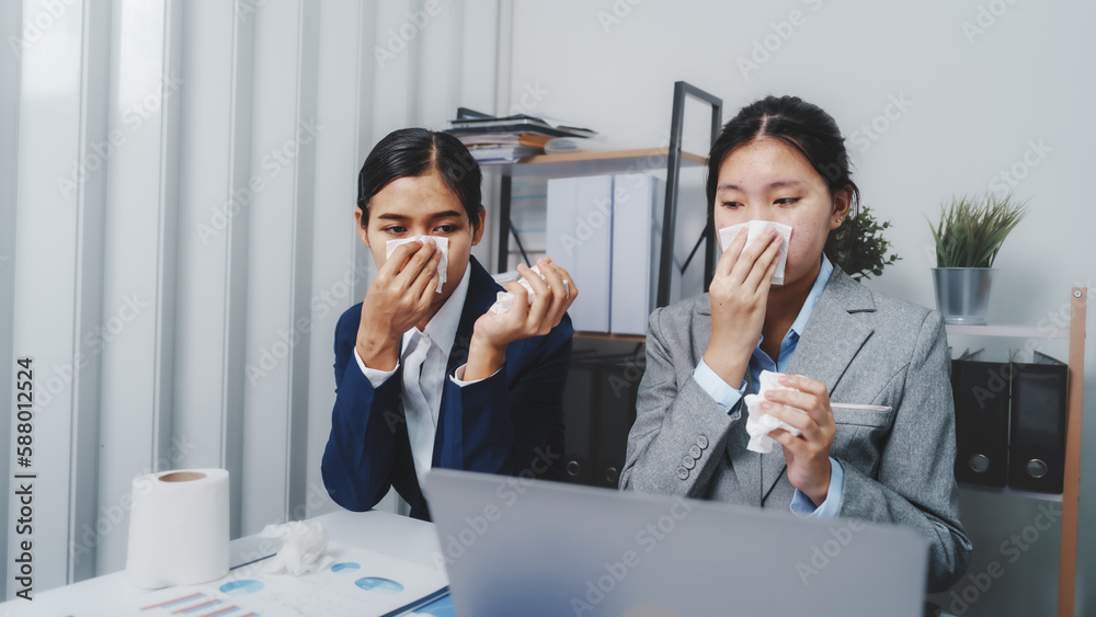 Young pretty asian business woman with friends having covid and sinus ...