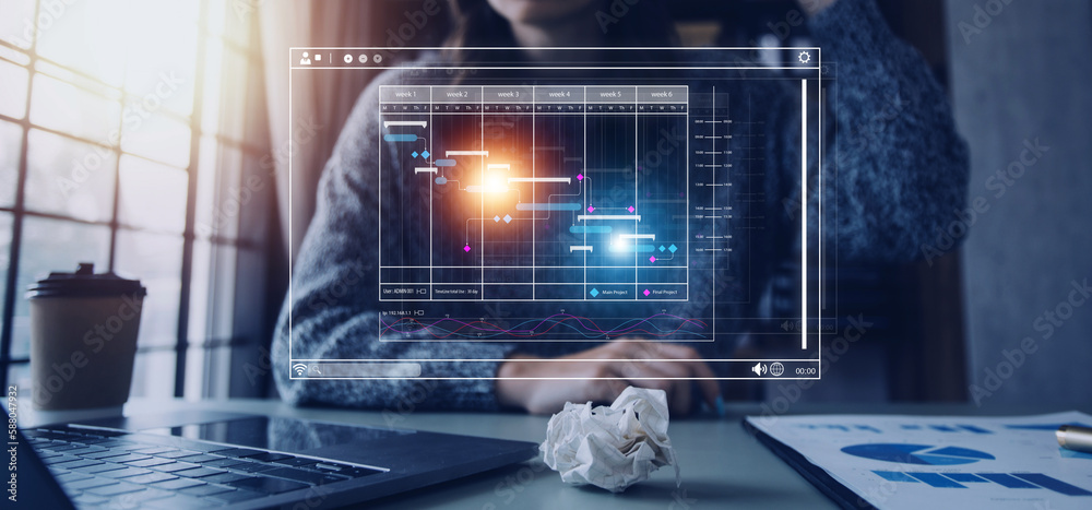 Zdjęcie Stock: Project manager working with Gantt chart schedule to ...