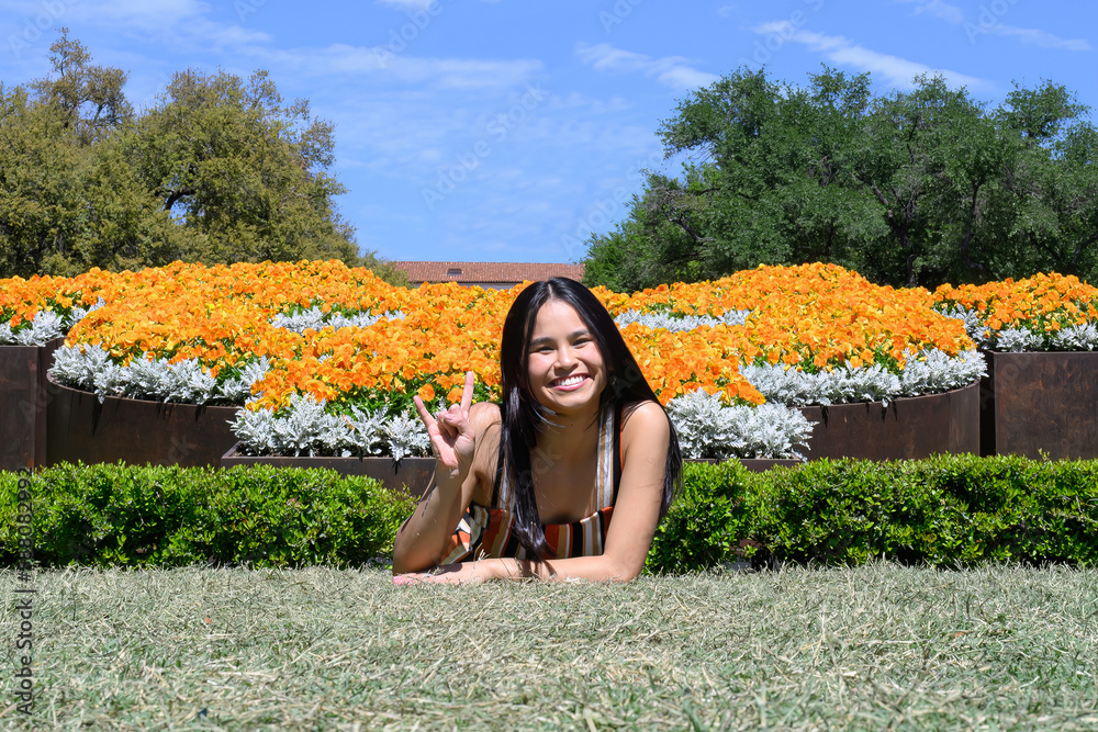 Young attractive Asian American college student, with her graduation ...