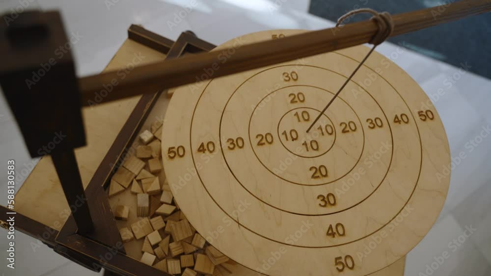 Video Stock Wooden round disk with engraved numbers zones of game ...