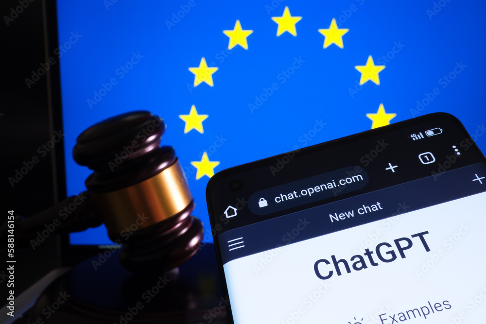 ChatGPT chatbot seen on smartphone, flag of EU on the laptop and gavel ...