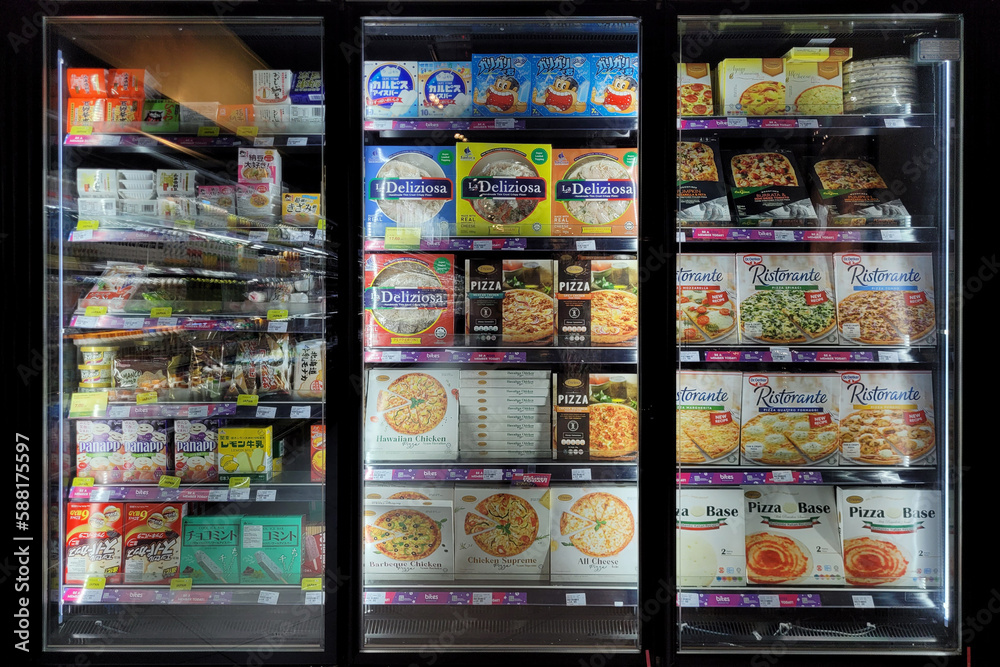 PENANG, MALAYSIA - 2 APR 2023: Interior view of huge glass freezer with ...