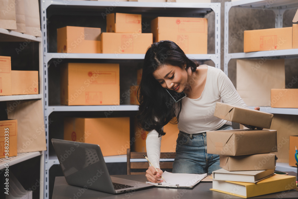 young beautiful woman smiling and happy with thumbs up handle the ...