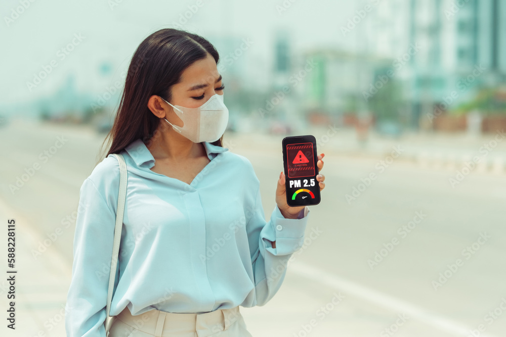 Asian Women wearing Protection Mask feels headaches and cough due to ...