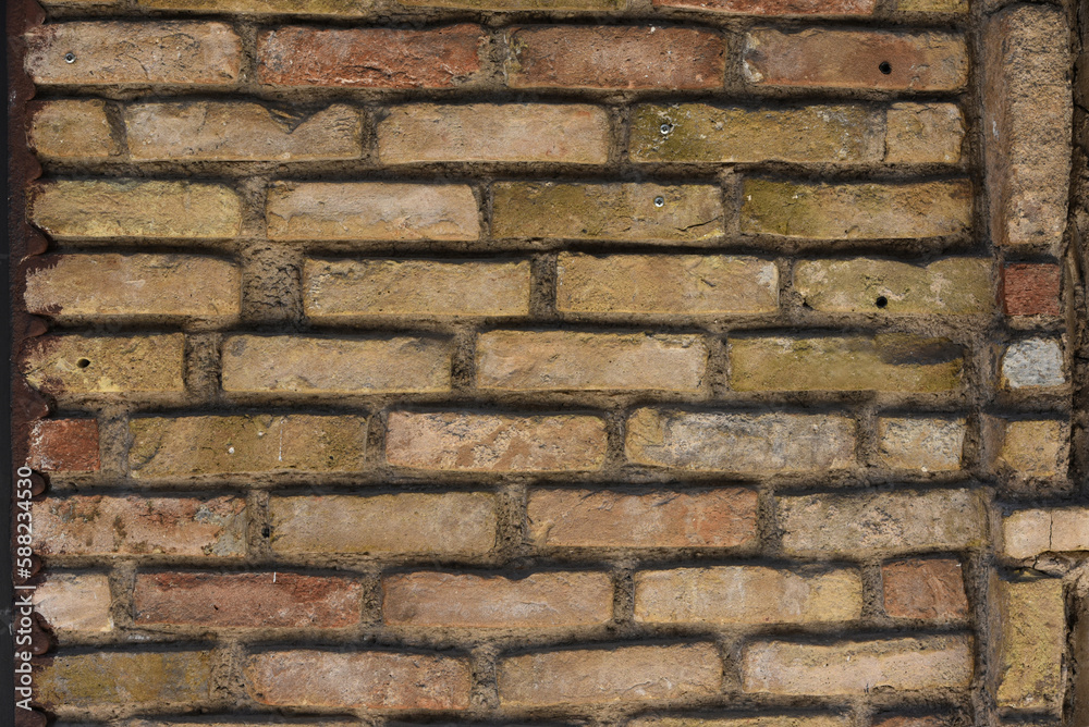 Brick wall texture, closeup of an old exterior surface as a background ...