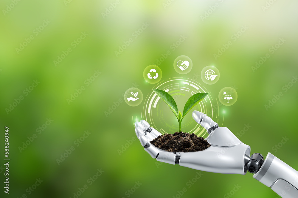 Environmental technology concept. Robot hand holding small plants with ...