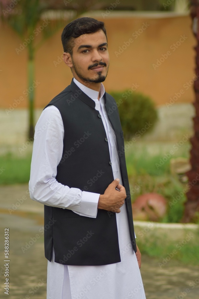 Young Man wearing shalwar kameez, Pakistani national dress. Stock Photo ...