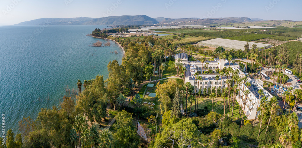 Aerial view of a luxury resort along the Jordan river coastline, Sea of ...