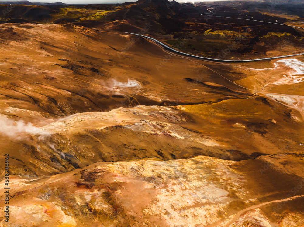 Aerial view of a volcanic hot spring with sulphuric smoke, Namafjall ...