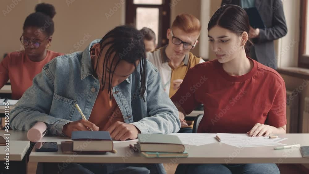 Vídeo do Stock: Waist up slowmo of multiethnic college students passing ...
