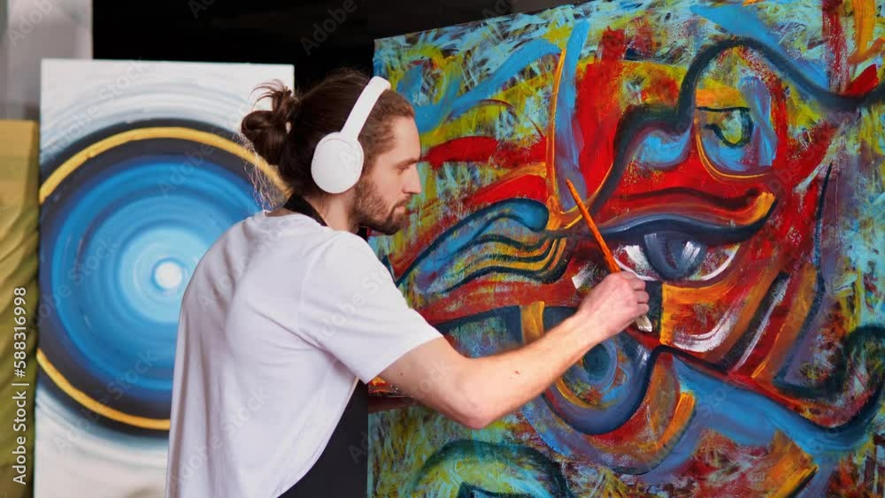 Video „Concentrated creative individual is an artist creating ...