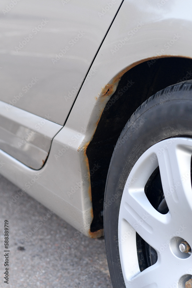 Signs of car corrosion or rust appearing on the rear arches of the car ...