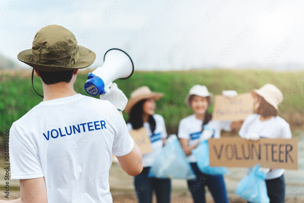 Group of diverse people volunteer teamwork holding campaign signs ...