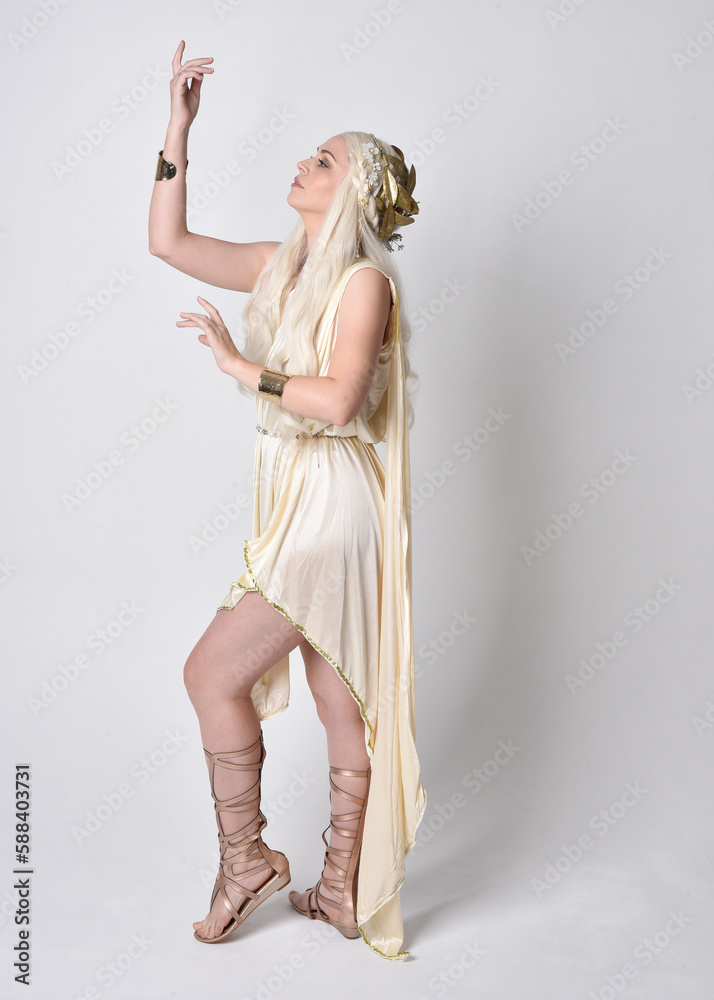Full length portrait of beautiful blonde woman wearing a fantasy ...