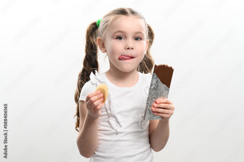 The child eats unhealthy and unhealthy food, the girl has chocolate and ...