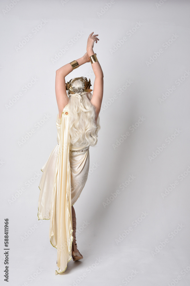 Full length portrait of beautiful blonde woman wearing a fantasy ...