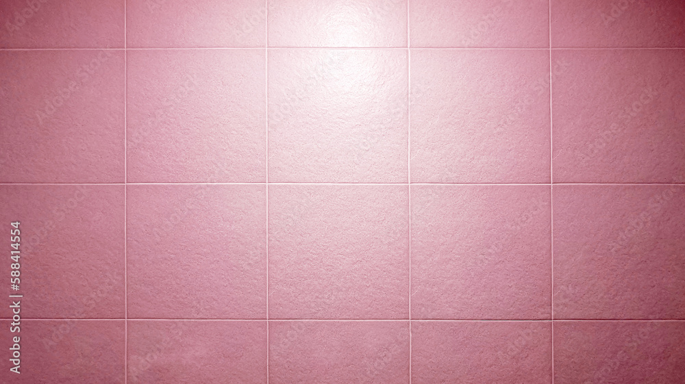 close up pink square tile pattern with light from above used as ...