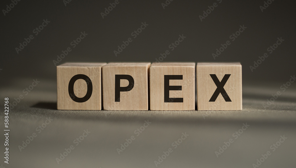 Tile letter in word opex - abbreviation of operating expense - on gray ...