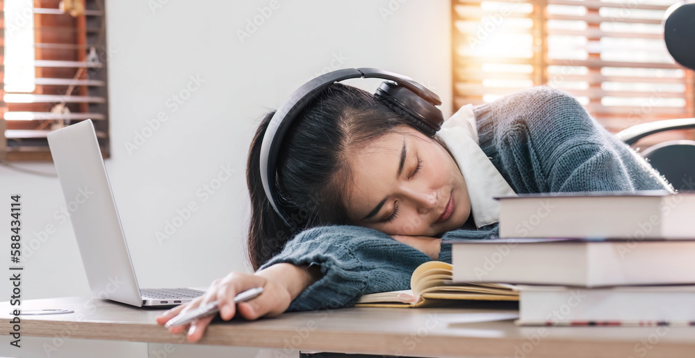 Bored young asian girl student studying, looking upset at laptop screen ...