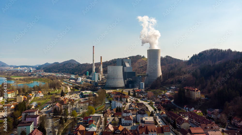 Latest generation thermal power plant with chimneys and cooling tower ...