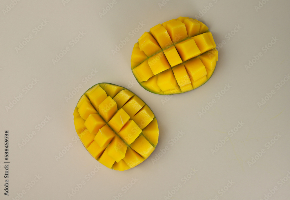juicy healthy fresh tropical mango rich in vitamins on a light beige ...