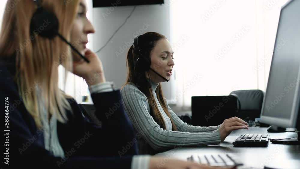 Vidéo Stock Call center employees work in office, answer customer calls ...