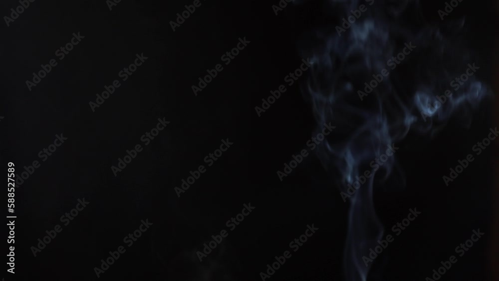 Black background and smoke. Lots of cigarette smoke. Suitable for ...