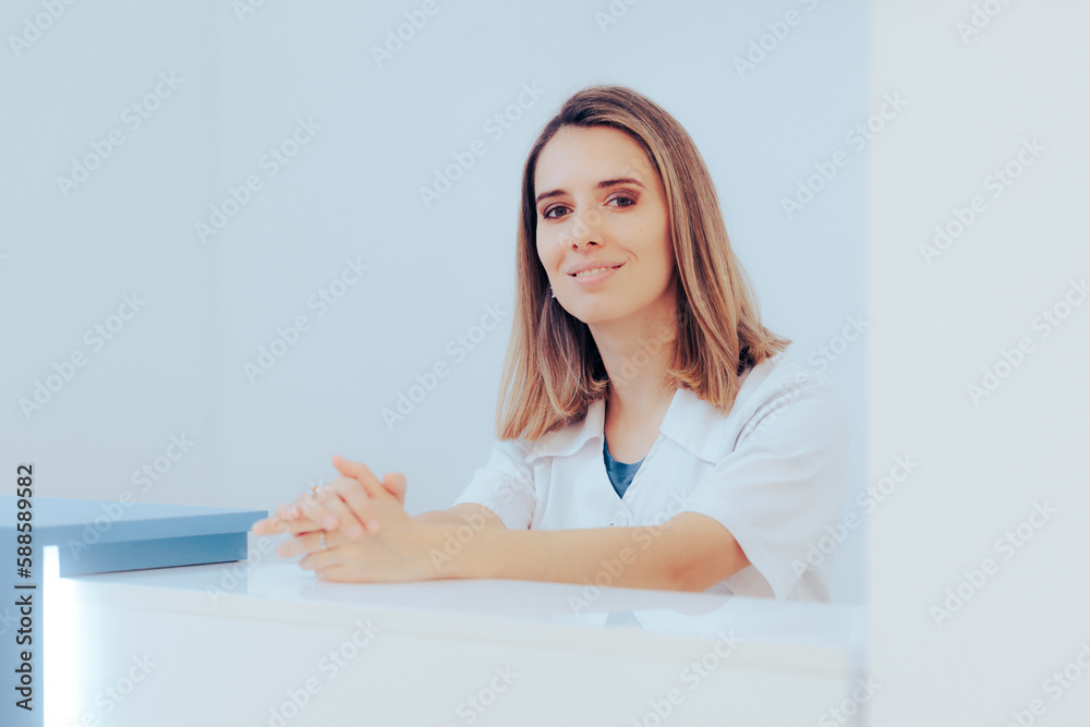Smiling Receptionist Standing at the Reception Desk in Medical Clinic ...