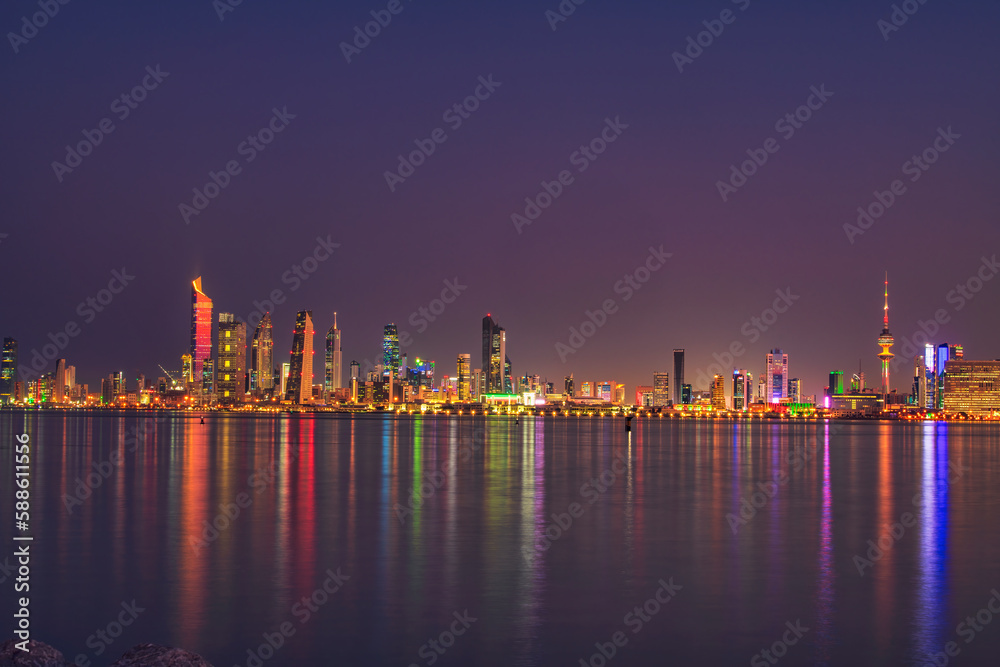 Kuwait Skyline view from beach during the national day celebration ...