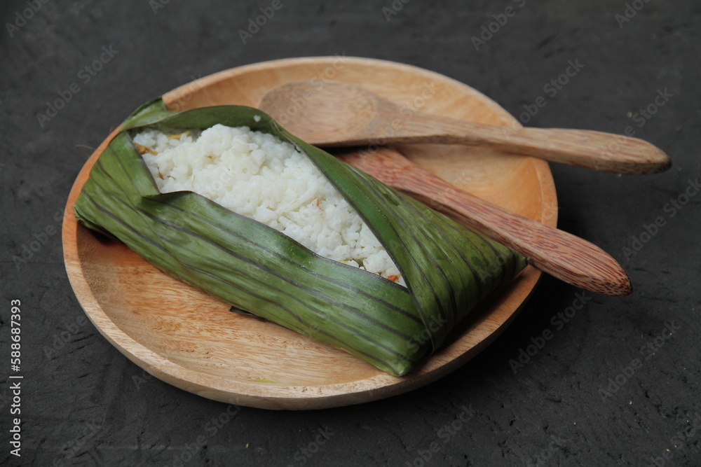Nasi bakar (Indonesian for "burned or grilled rice") refer to steamed ...