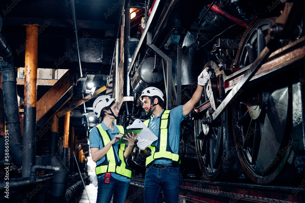 Team of engineer railway wearing safety uniform and helmet under ...