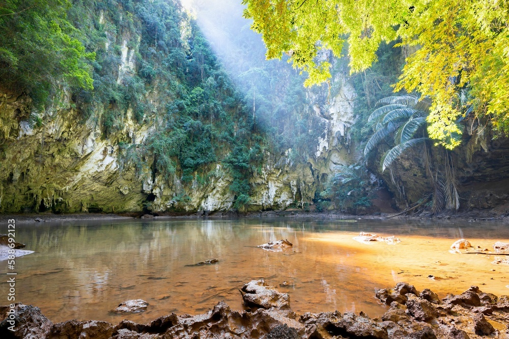 Sunlight falling into the Princess Lagoon surrounded by the big cliffs ...