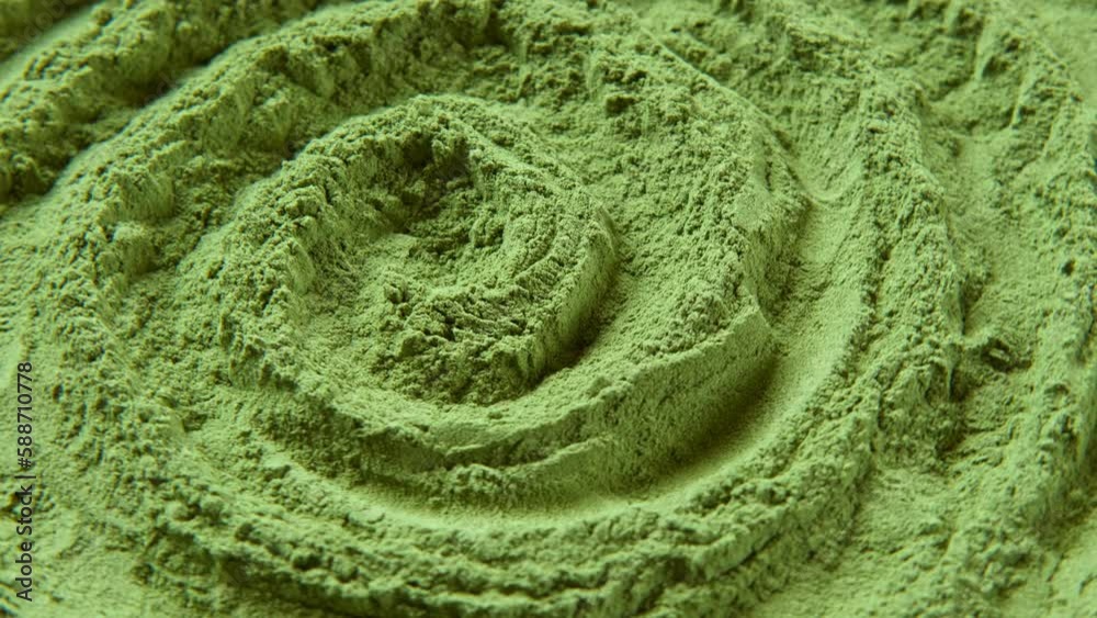 Chlorella or spirulina algae green powder is spinning, rotation ...