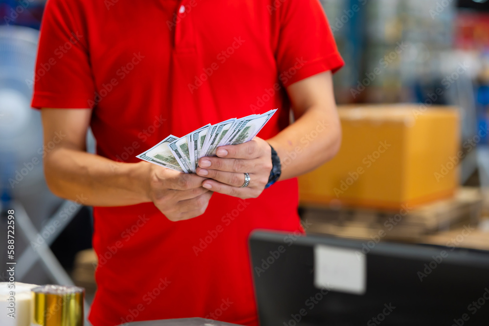 Hands counting money dollar bills. warehouse man worker wearing hard ...