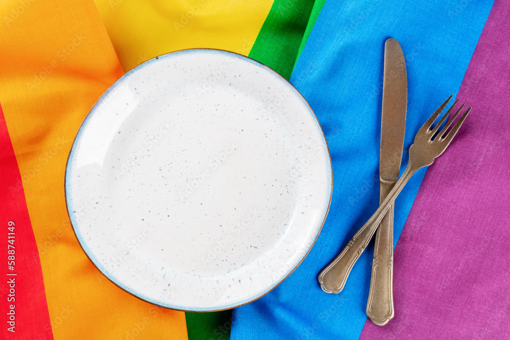 Gay food concept. A plate with cutlery, overhead flat lay shot on the ...