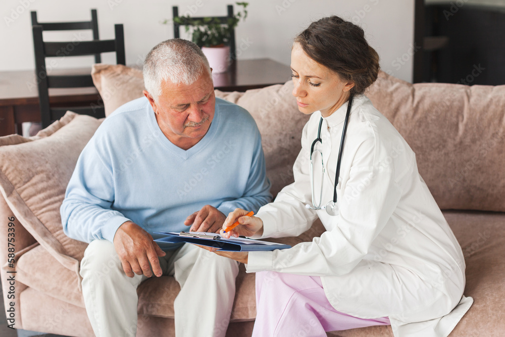 Female professional doctor showing medical test result explaining ...