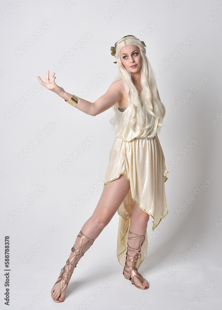 Full length portrait of beautiful blonde woman wearing a fantasy ...