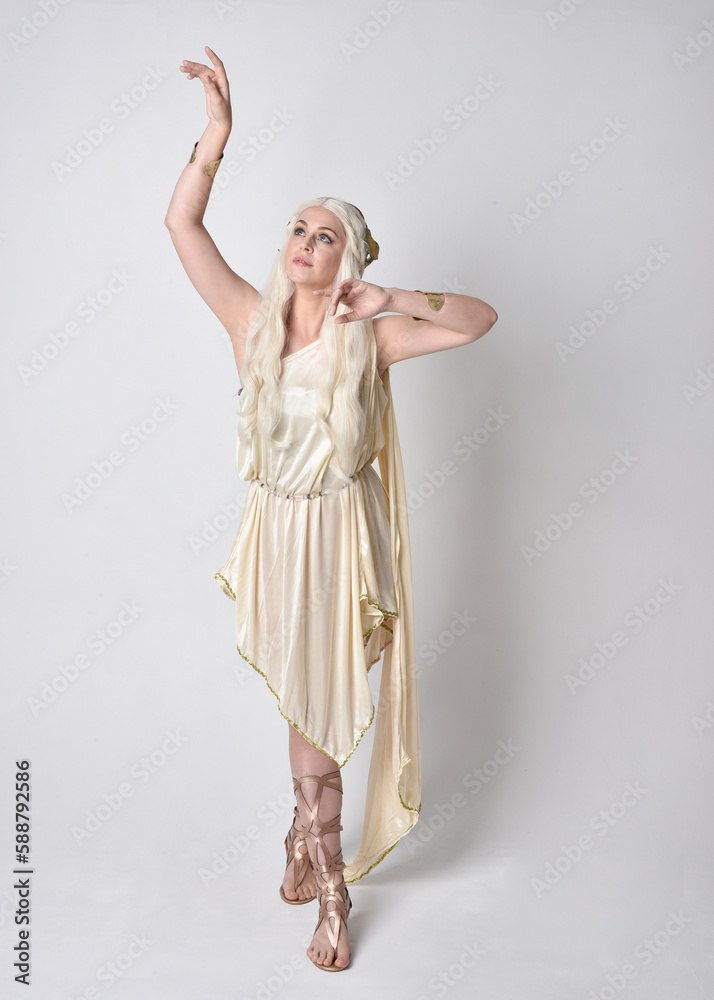Full length portrait of beautiful blonde woman wearing a fantasy ...