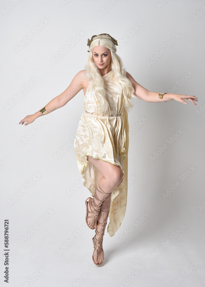 Full length portrait of beautiful blonde woman wearing a fantasy ...