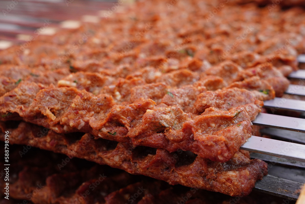 Traditional Turkish Adana Kebab or Kebap meat texture background with ...