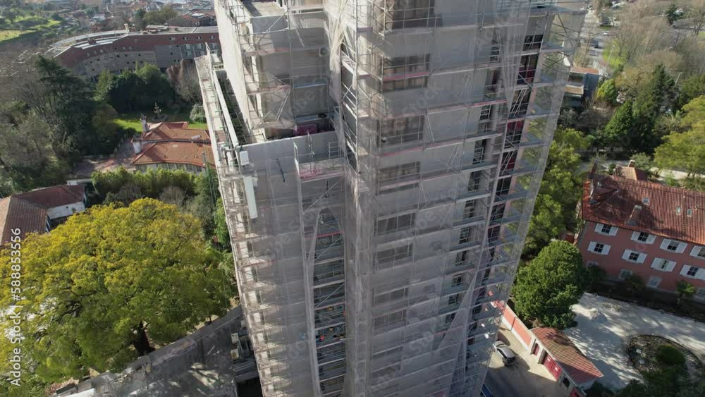 The facade of the Tall high-rise building under construction with ...