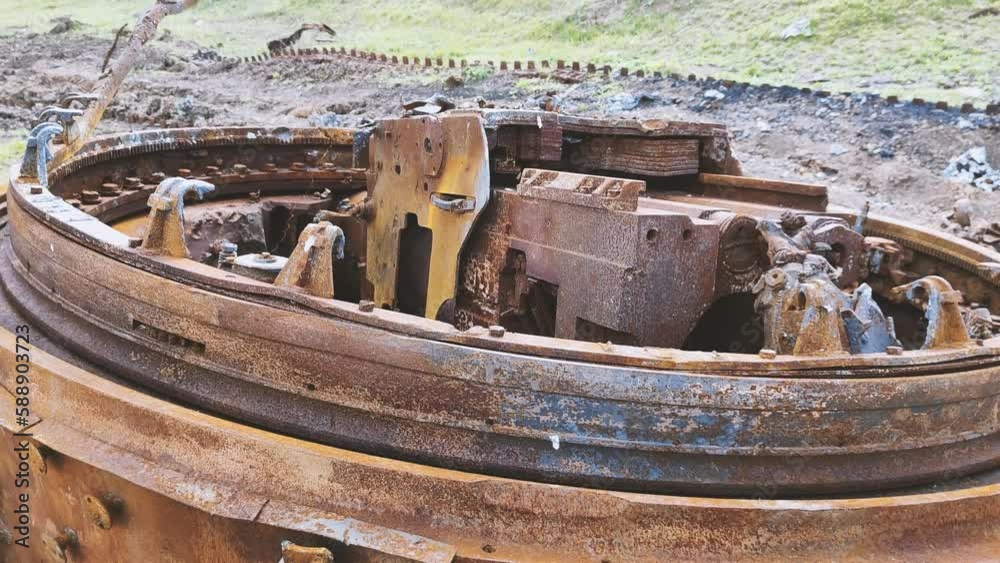 tank turret of a Russian tank is lying around separately from the tank ...