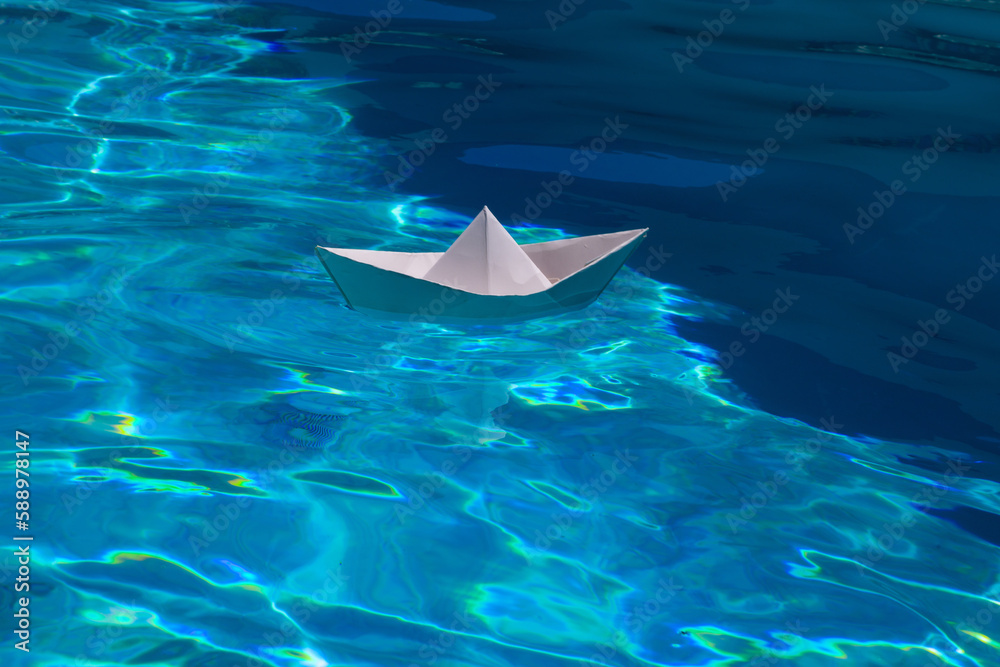 Paper ship. Paper boat in blue sea background. Tourism, travel dreams ...