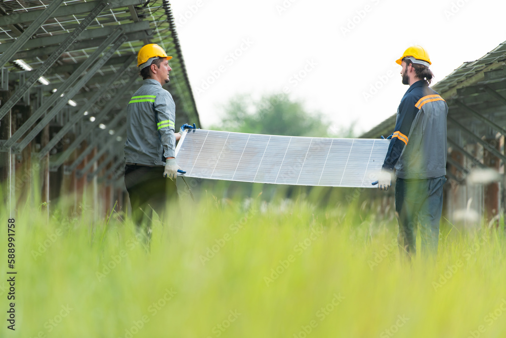 Engineering and technician unloading repaired solar panels to be ...